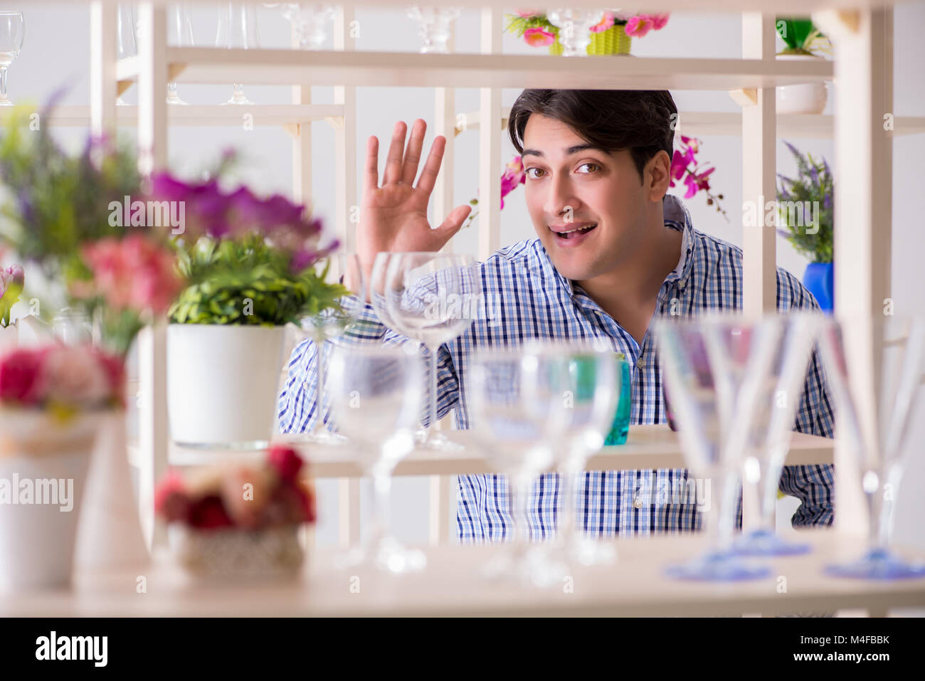 Young handsome man shopping in shop Stock Photo - Alamy