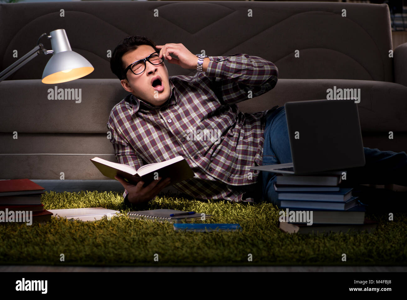 Student reading books preparing for exams Stock Photo - Alamy