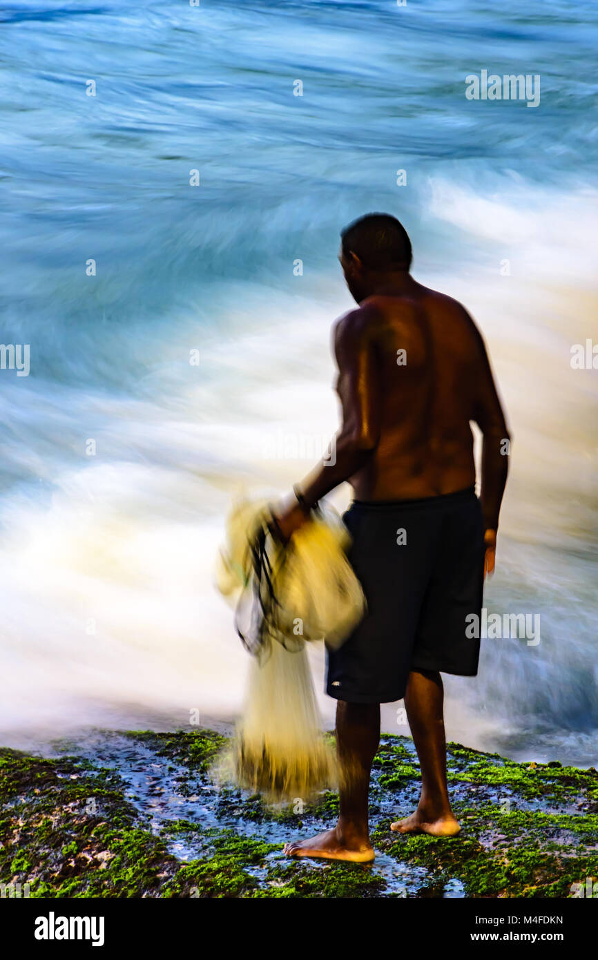 The fisherman and the sea Stock Photo - Alamy