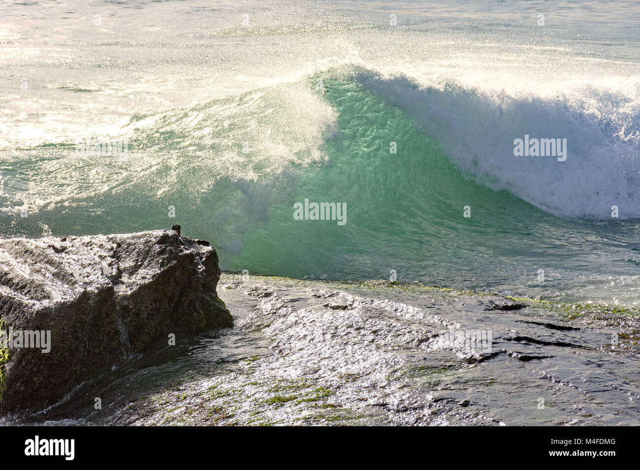 Waves crashing on coastal rocks hi-res stock photography and images - Alamy