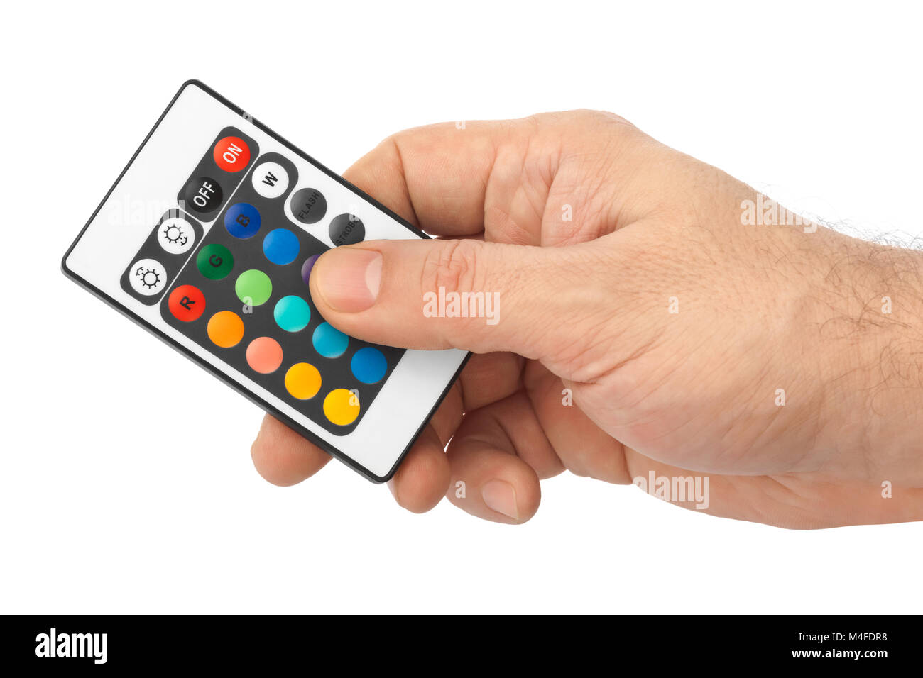 Remote control for change colors in hand Stock Photo - Alamy