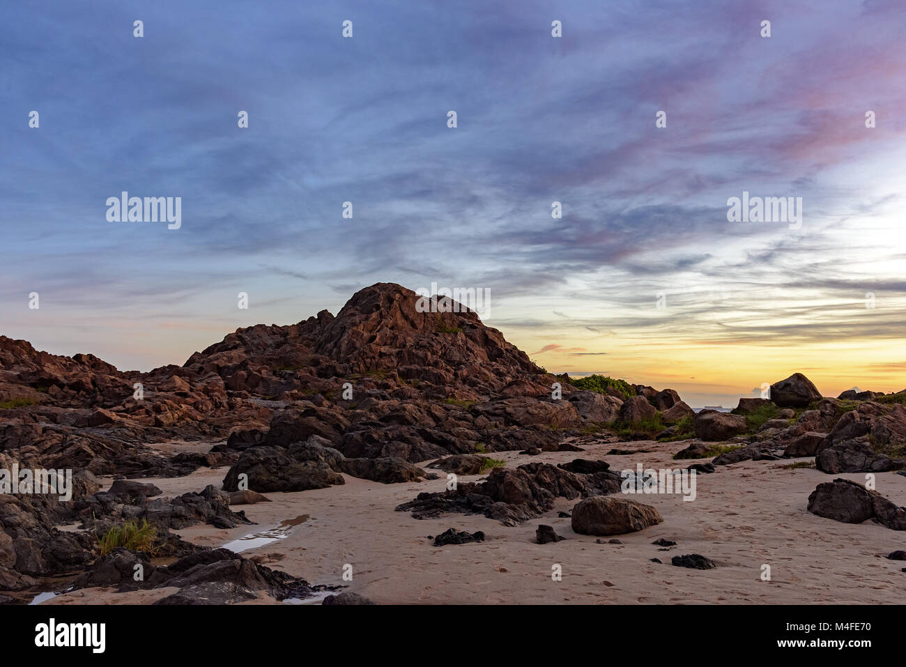 All Saints Bay rocks at sunset Stock Photo - Alamy