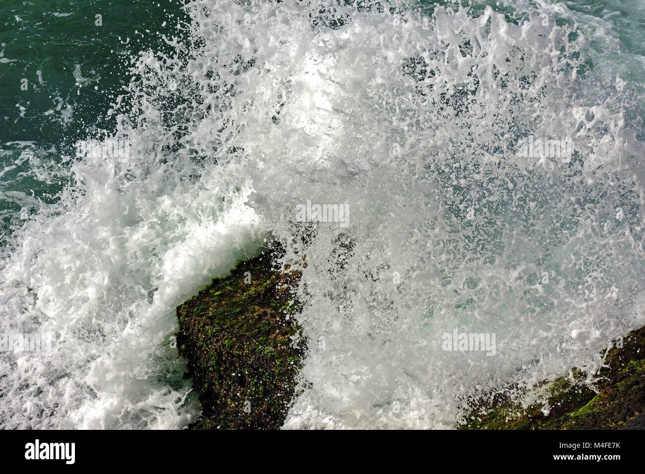 Sea water splashing Stock Photo - Alamy