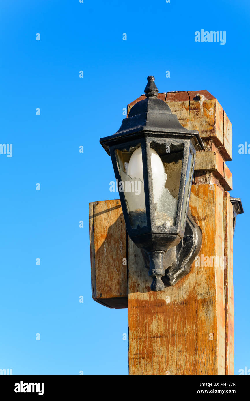Old wooden lamp post light hi-res stock photography and images - Alamy