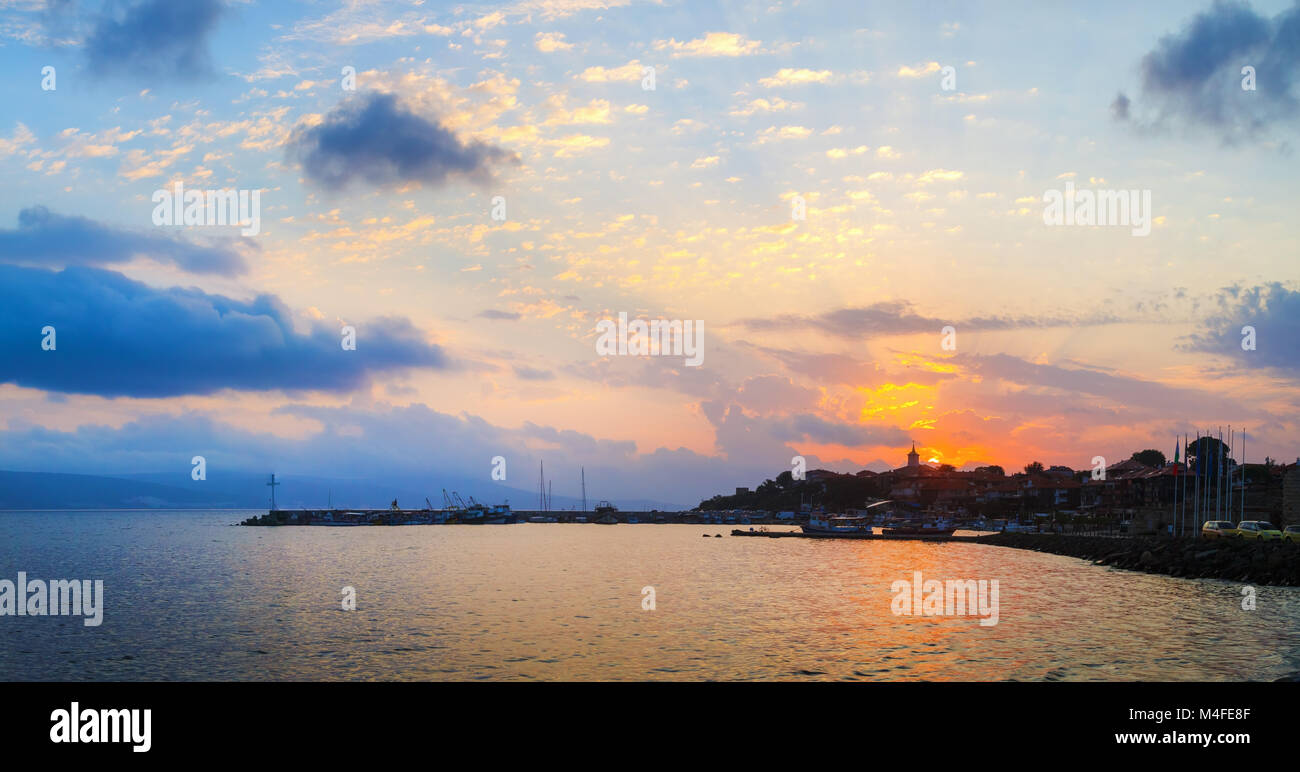 Sunrise and coastline Stock Photo - Alamy