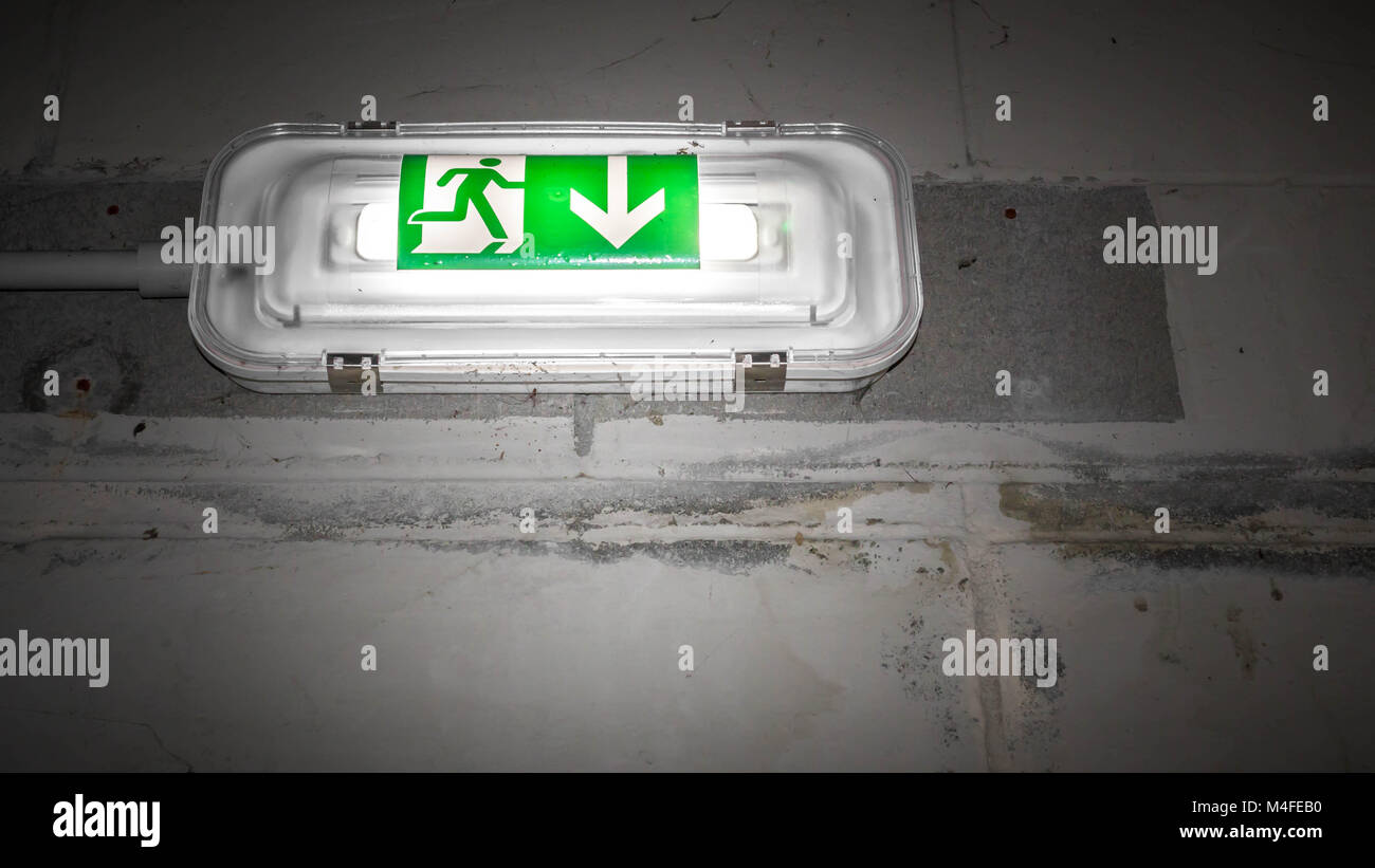 Old green fire exit sign hi-res stock photography and images - Alamy