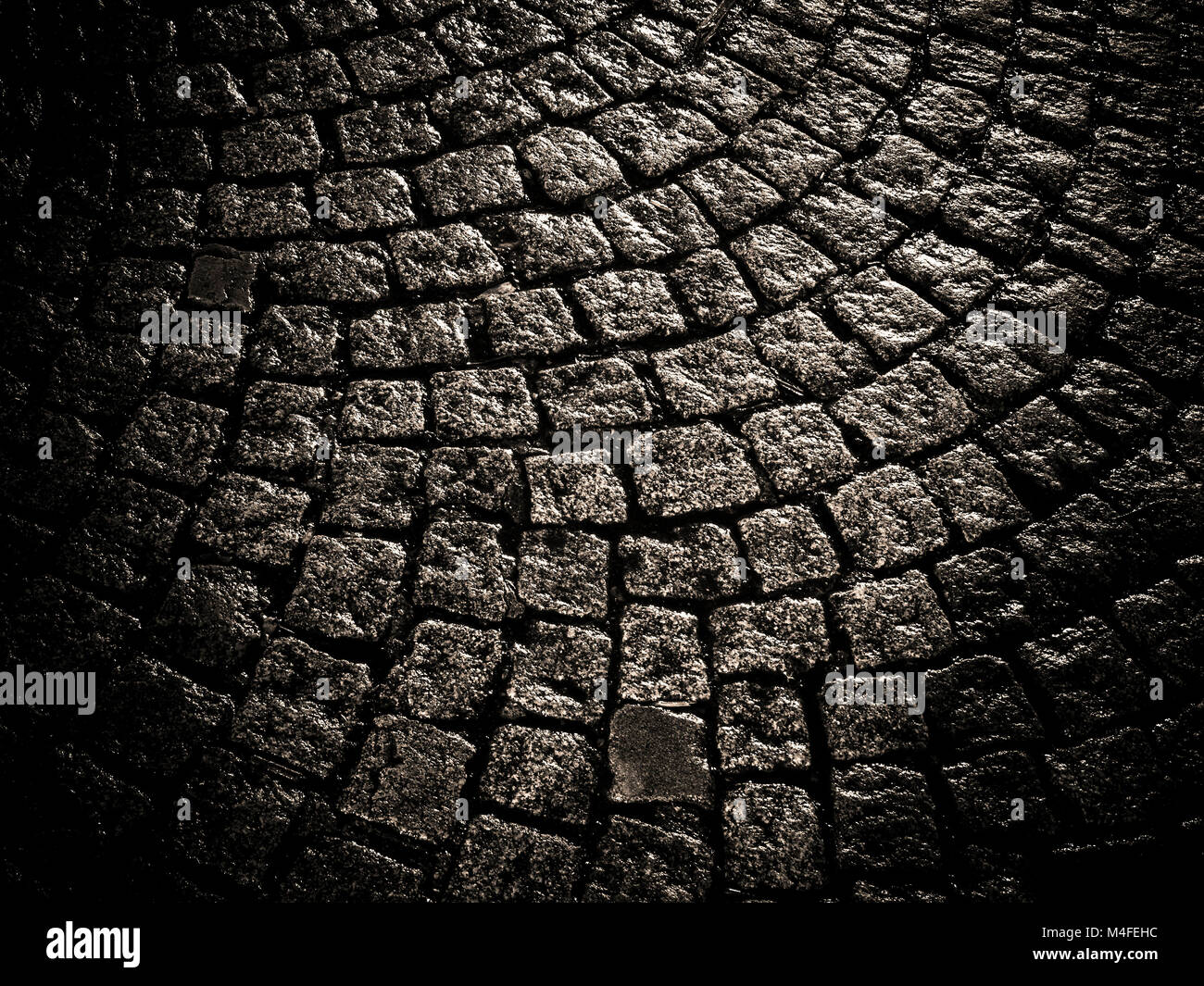 Wet cobblestone pavement hi-res stock photography and images - Alamy