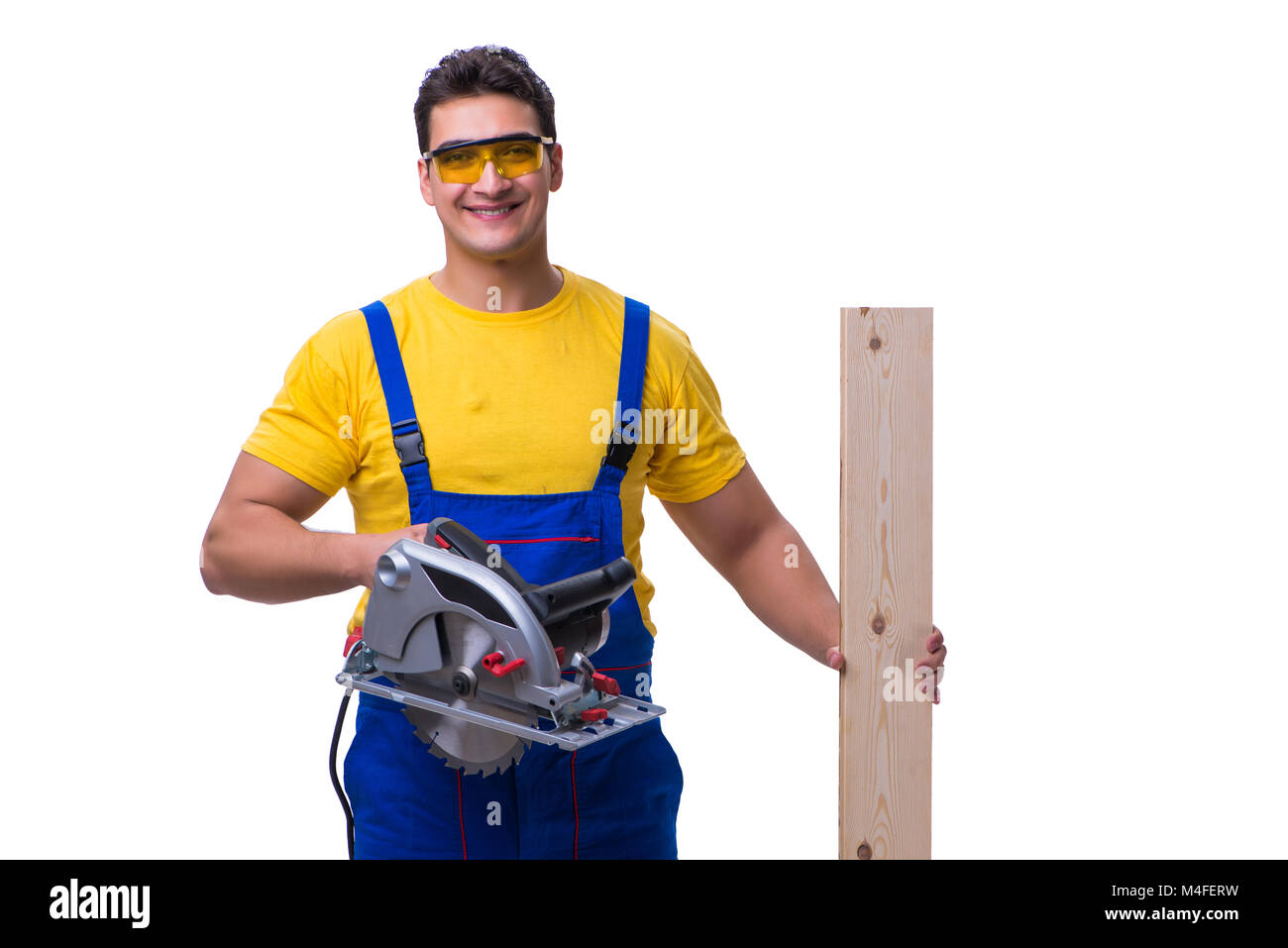 Carpenter wearing goggles cutting hi-res stock photography and images ...