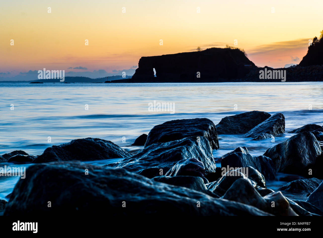 A landscape image of the rocks on the sea front, in the background is ...