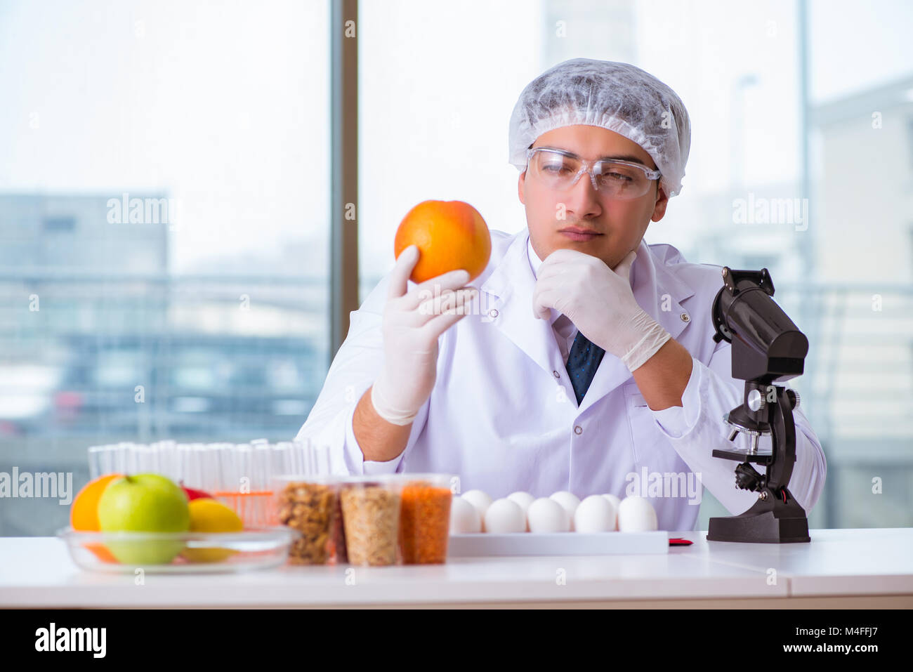 Nutrition expert testing food products in lab Stock Photo - Alamy