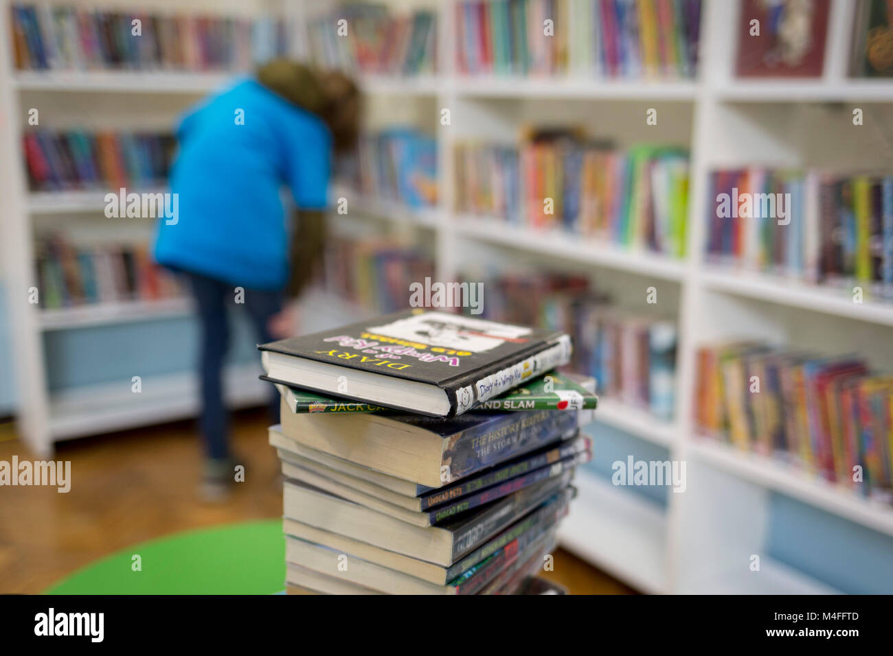 Childrens books stack pile hi-res stock photography and images - Alamy