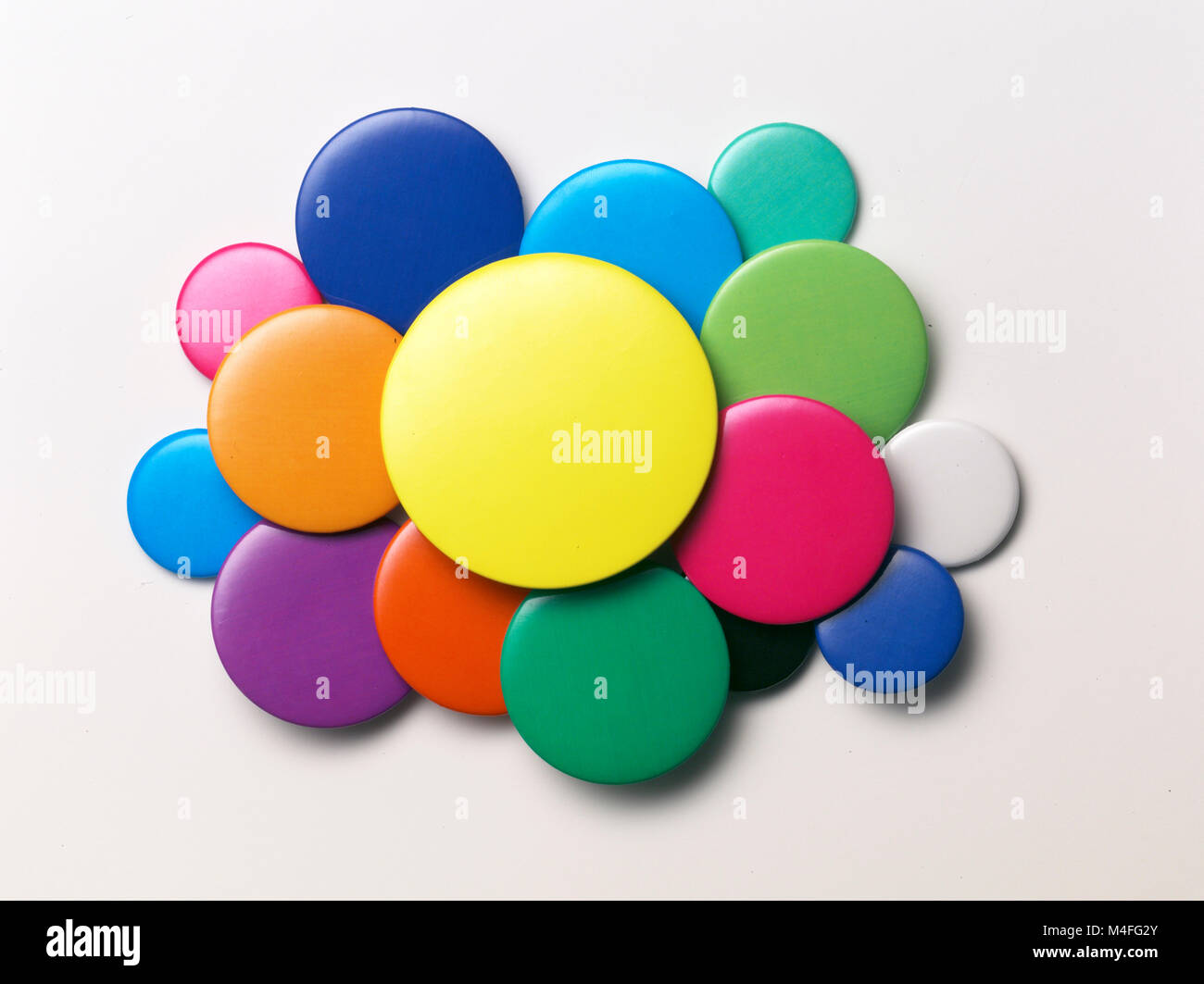 a collection of round badges of different colours plain and clean Stock ...