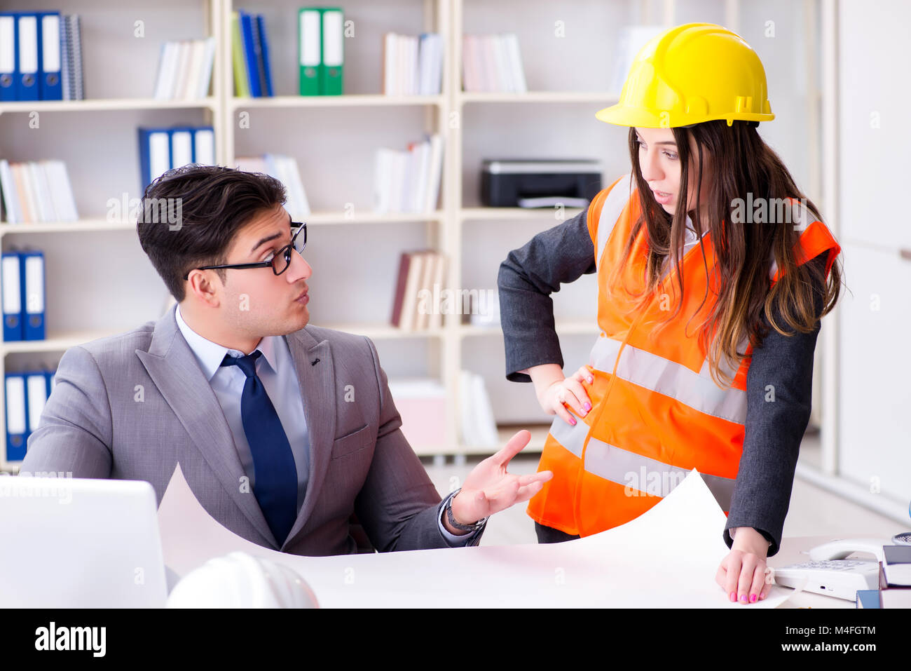 Reviewing construction hi-res stock photography and images - Alamy