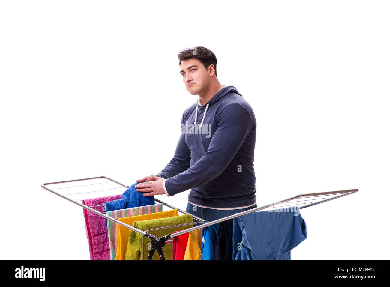 Husband man doing laundry isolated on white Stock Photo - Alamy