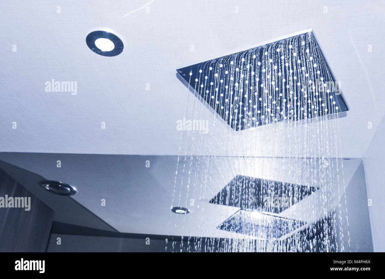 Detail of modern ceiling shower Stock Photo - Alamy