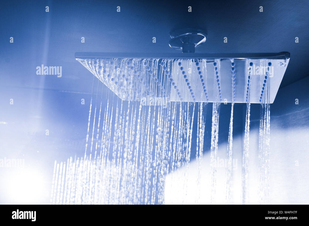 Detail of modern ceiling shower Stock Photo - Alamy