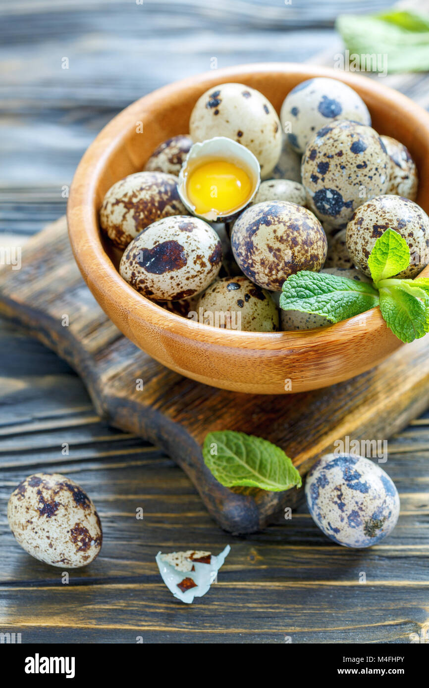 Bowl of quail eggs and the yolk in the shell Stock Photo - Alamy