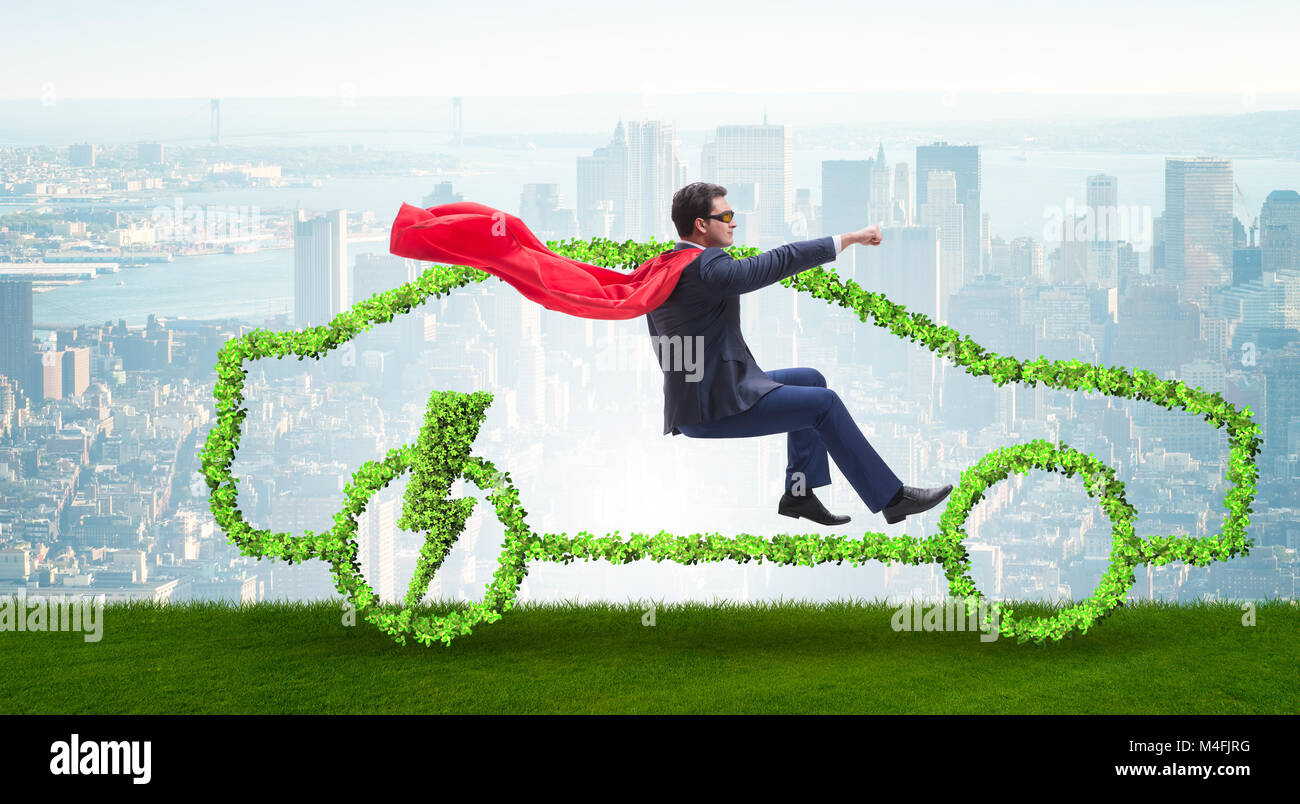 Electric car concept in green environment concept Stock Photo - Alamy