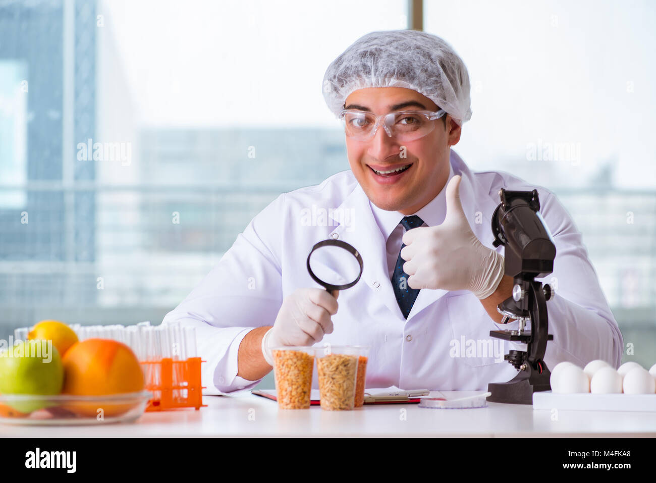 Nutrition expert testing food products in lab Stock Photo - Alamy