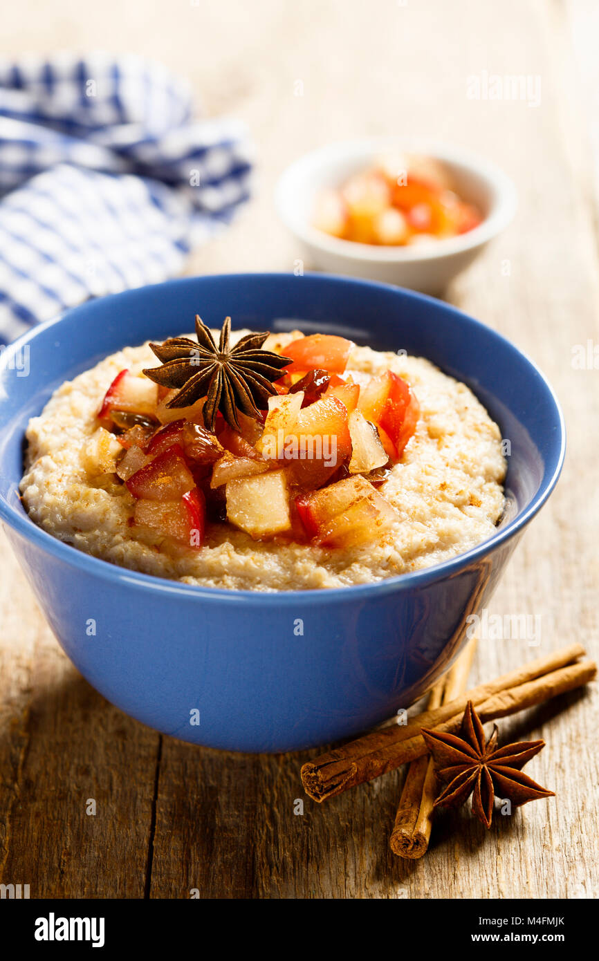 Homemade oatmeal porridge with apple and spices Stock Photo - Alamy