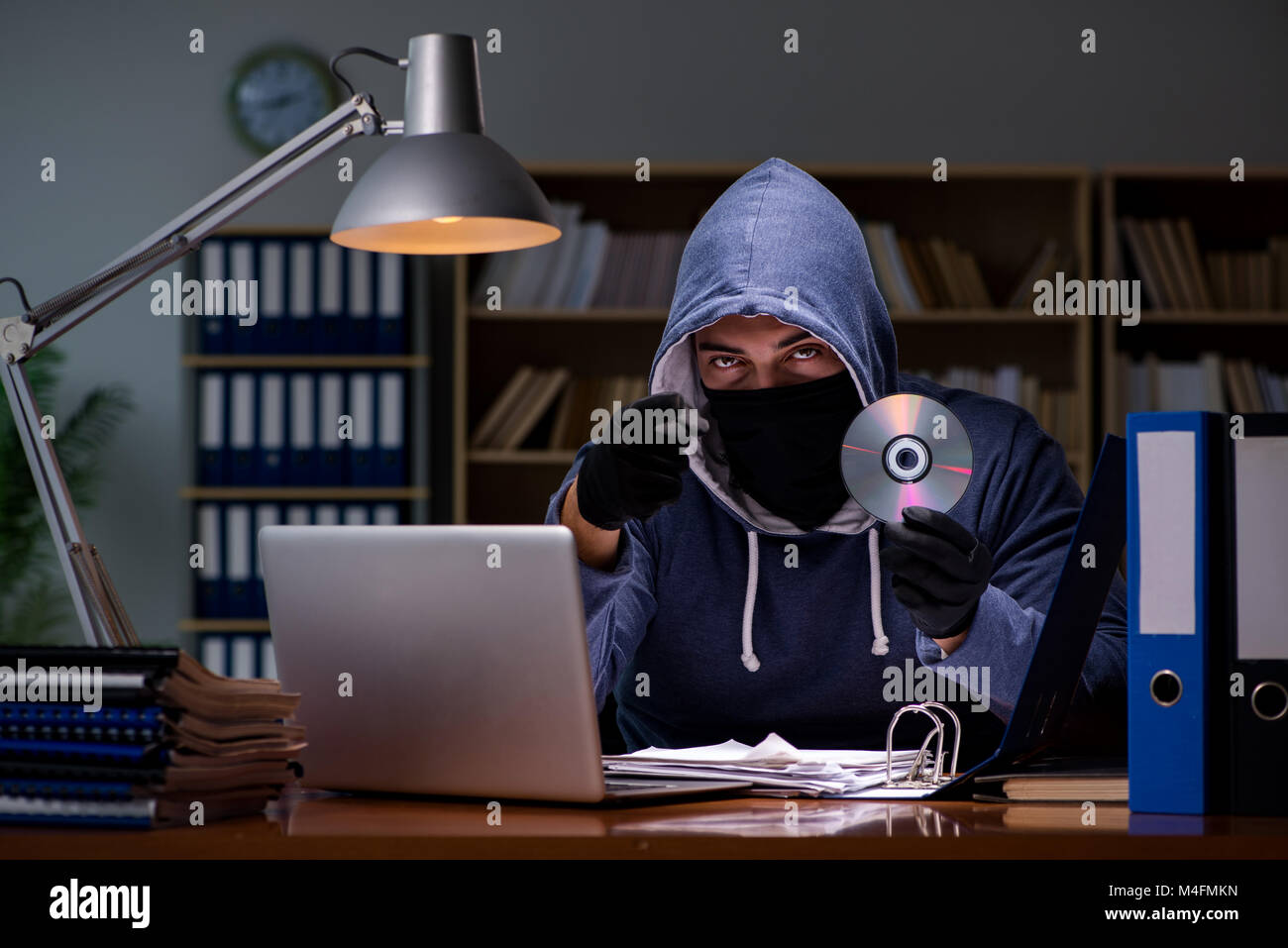 Hacker stealing personal data from home computer Stock Photo - Alamy