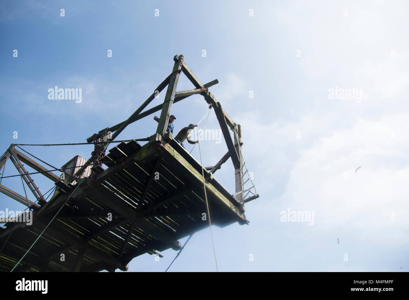 Guano collectors in ballesta islands, Peru Stock Photo - Alamy