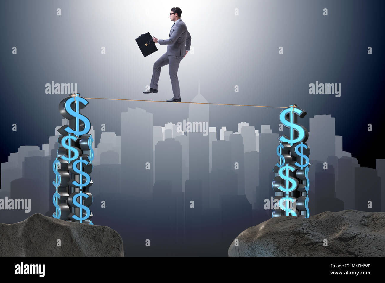 Businessman walking on tight rope Stock Photo - Alamy