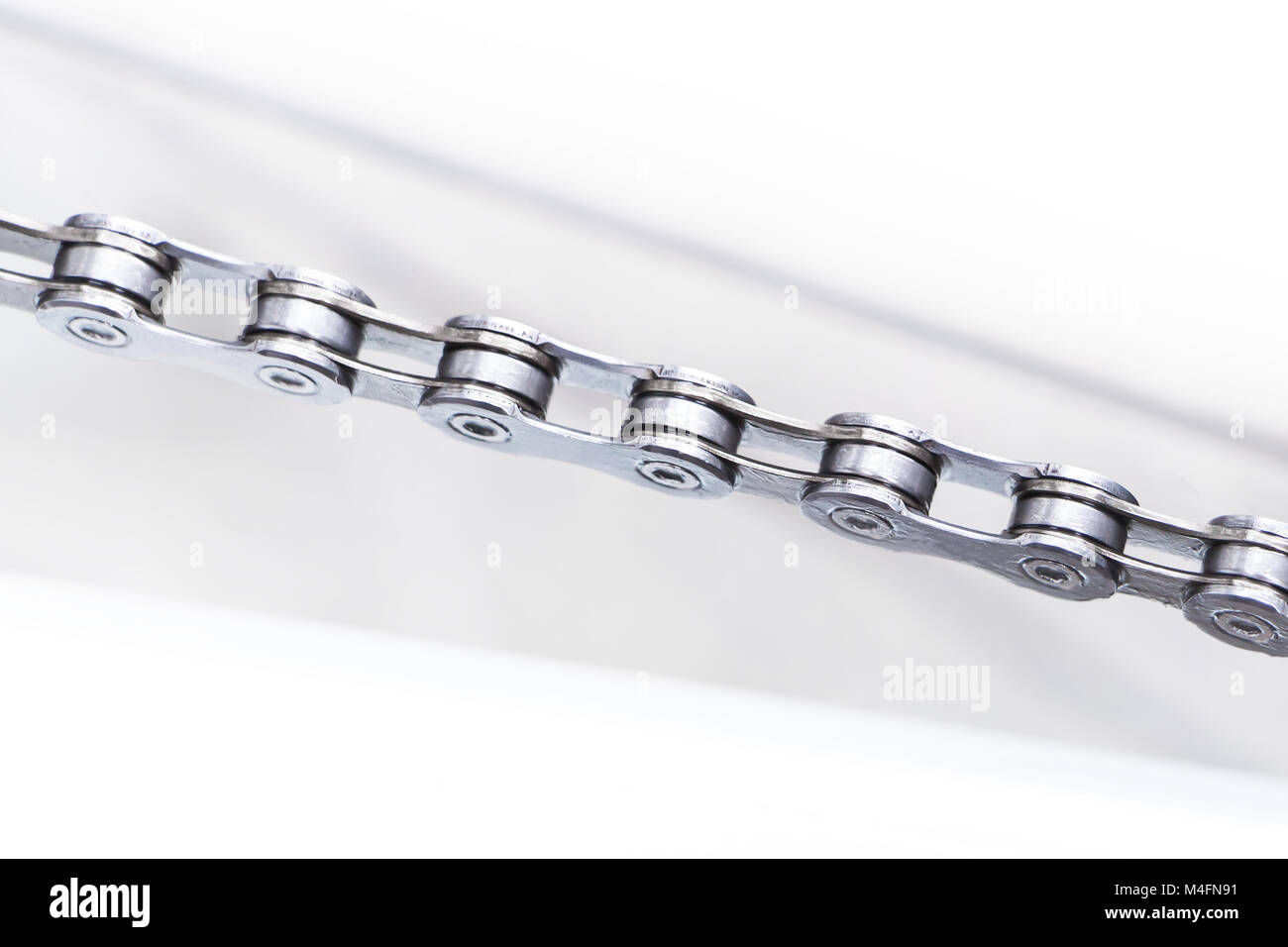 New and clean silver mountain bike chain detail for wallpaper or ...