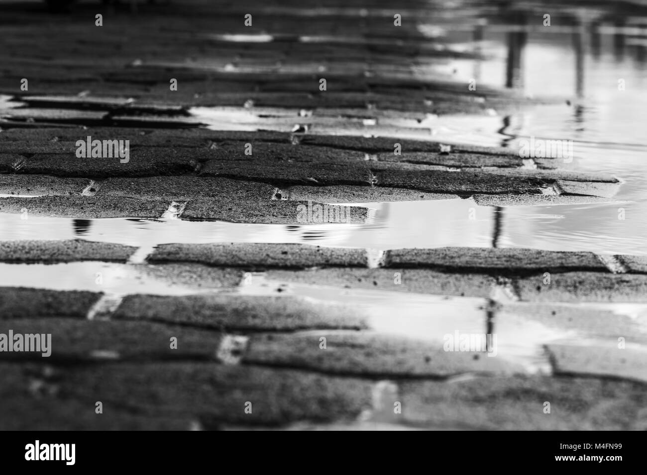 Wet footpath Black and White Stock Photos & Images - Alamy