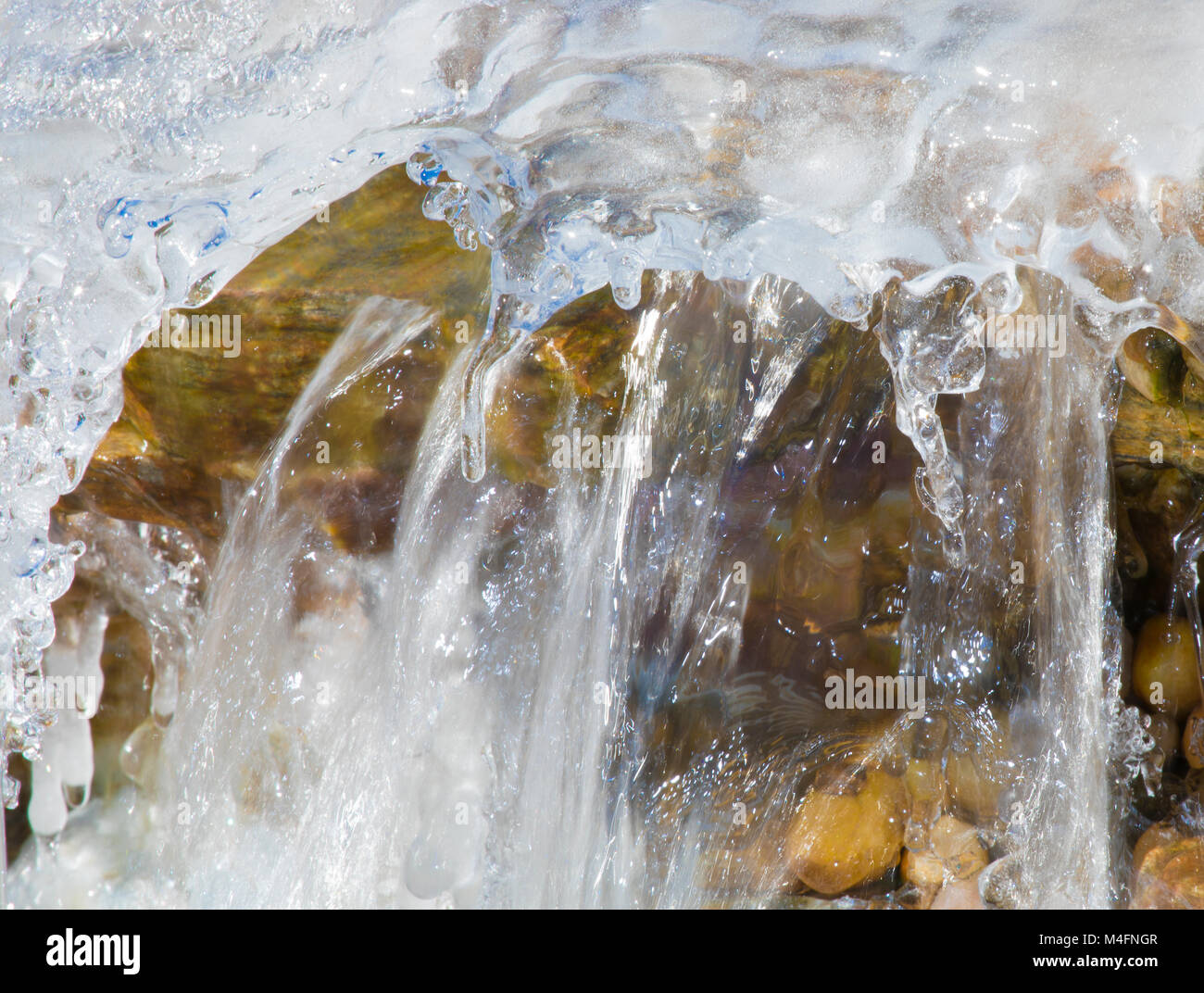 After the snow bomb cyclone ice forming on a small cascade Stock Photo ...