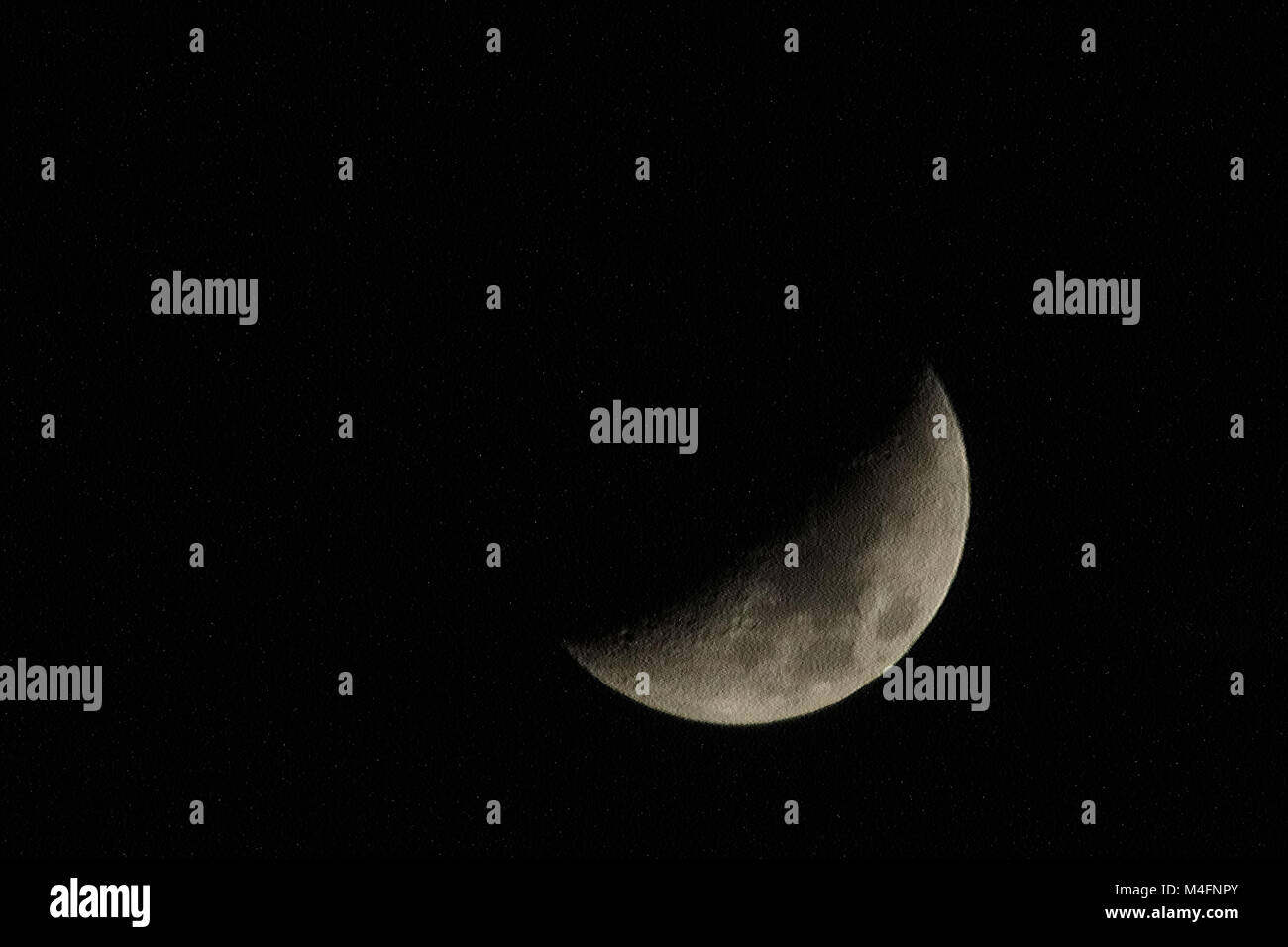 Partial moon shot in the night sky Stock Photo - Alamy