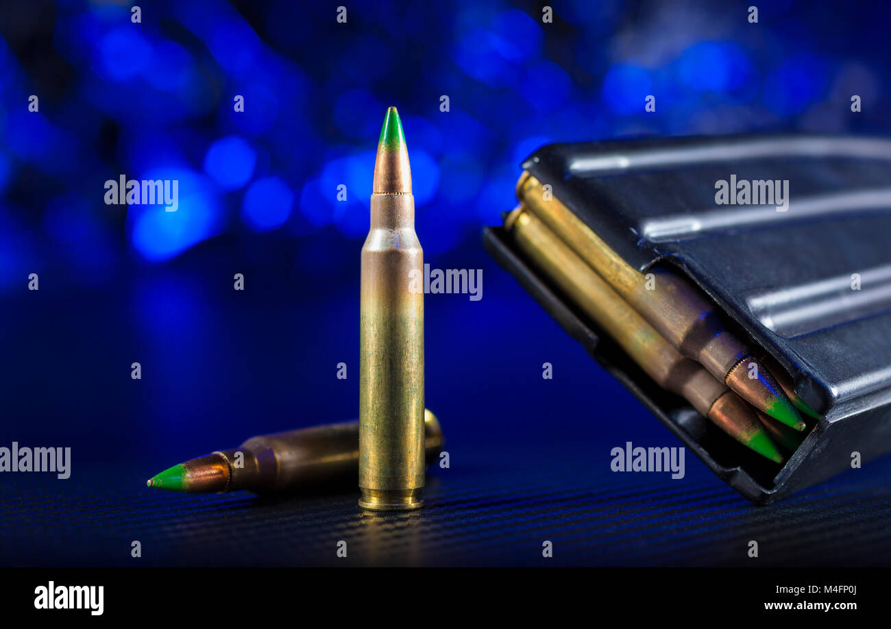 M855 ammunition for an AR-15 with magazine on blue background Stock ...