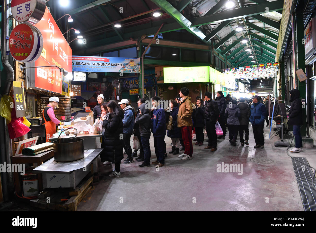 Gangneung, South Korea. 16th Feb, 2018. Customers standing in a queue ...
