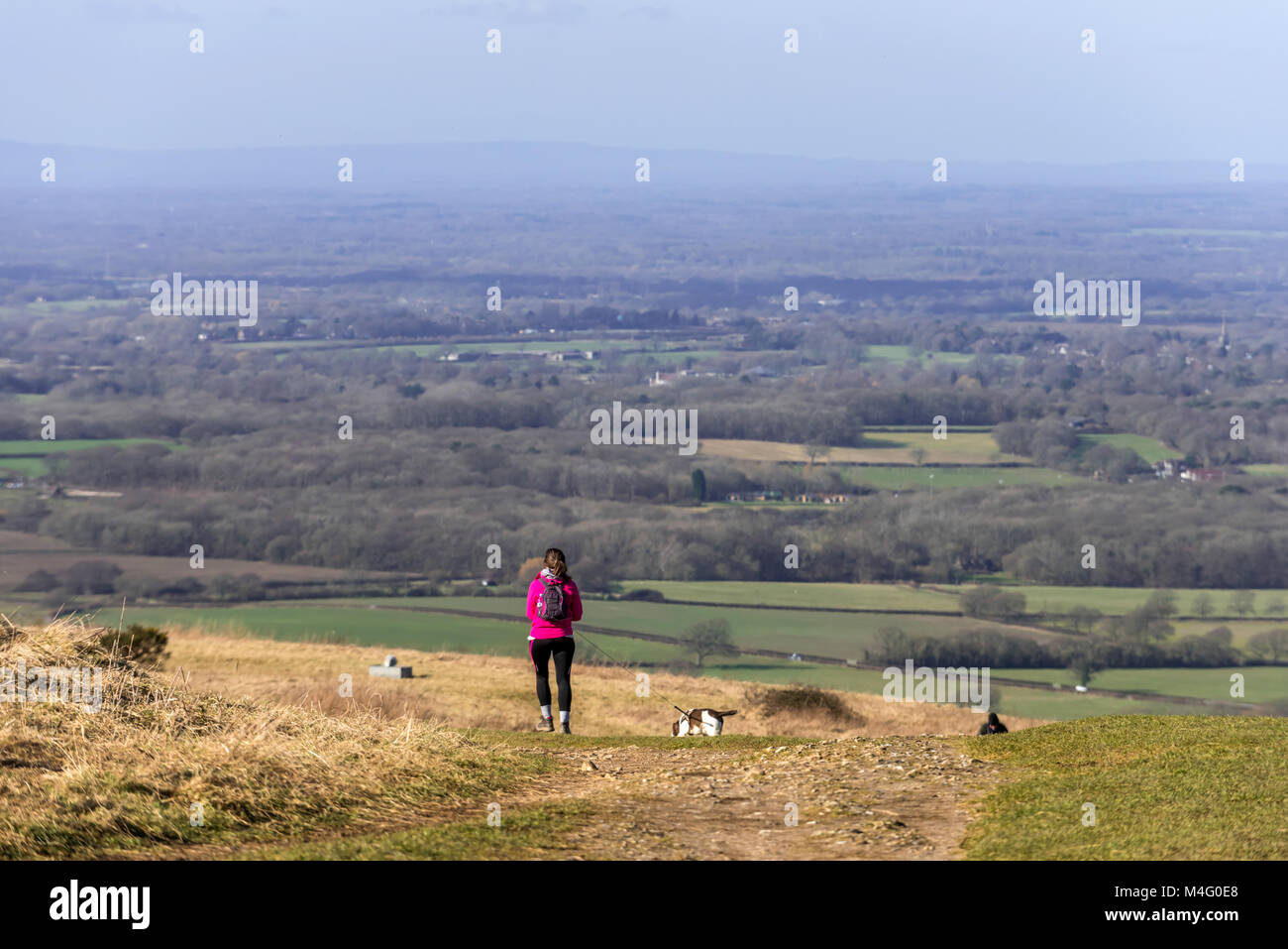 Ditchling Beacon, UK. 16th February, 2018. Walkers enjoying the ...