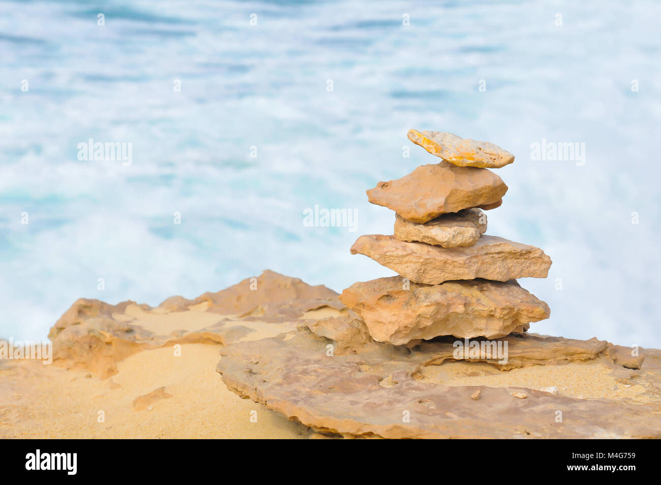 Meditation, relaxation, or life balance concept with pile of rocks ...