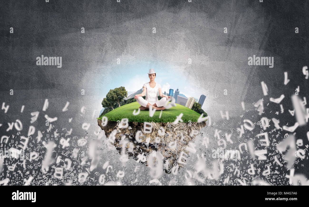 Young woman keeping mind conscious Stock Photo - Alamy