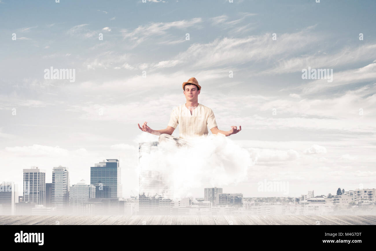 Young man keeping mind conscious Stock Photo - Alamy