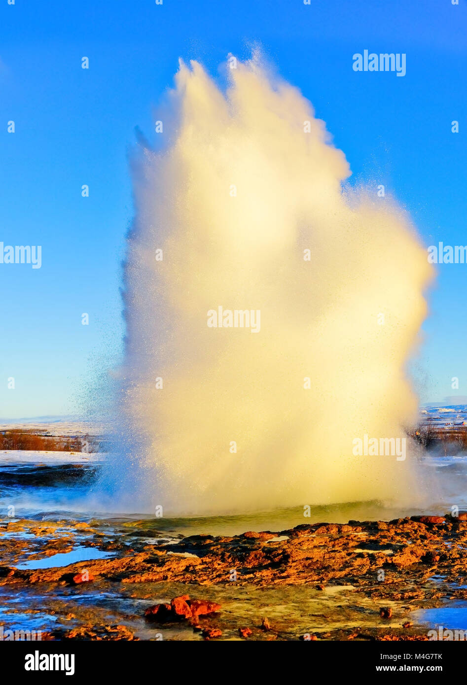 Eruption of Strokkur Geyser in winter, where is on the popular route of ...