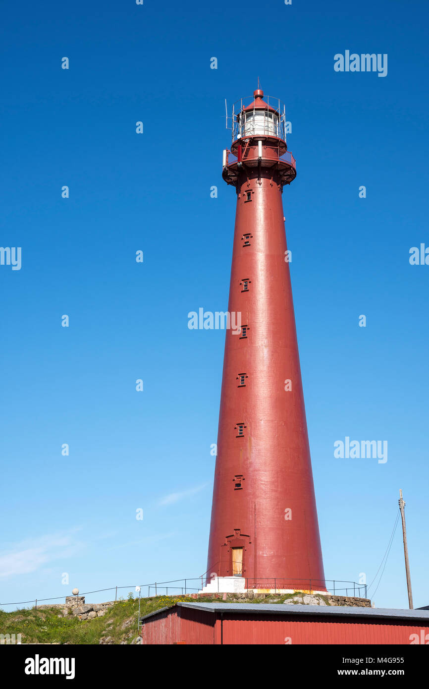 red lighthouse in Andenes at the beginning of National Tourist Route ...