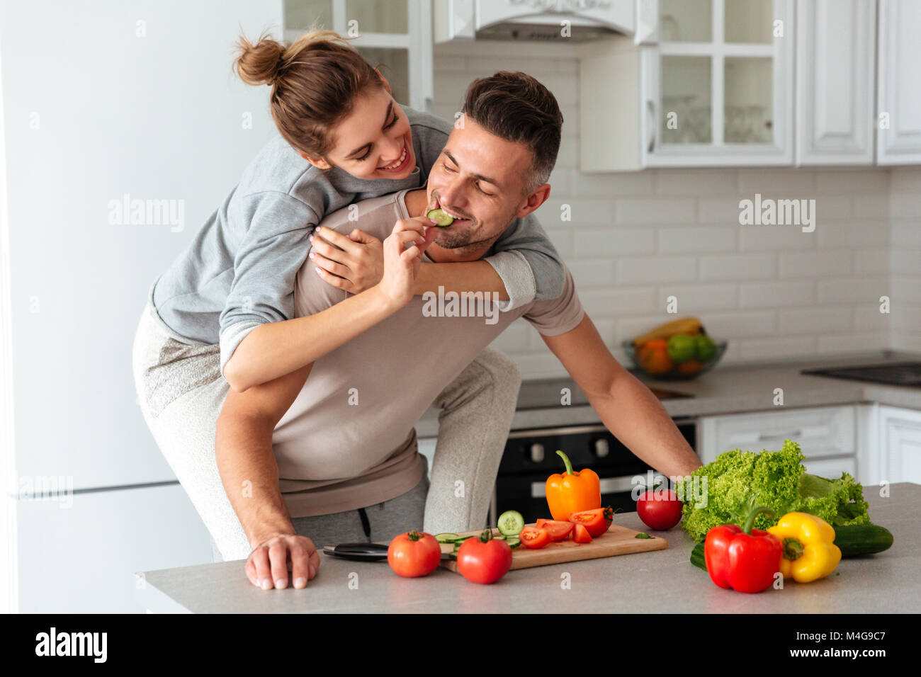 Woman on mans shoulders hi-res stock photography and images - Alamy