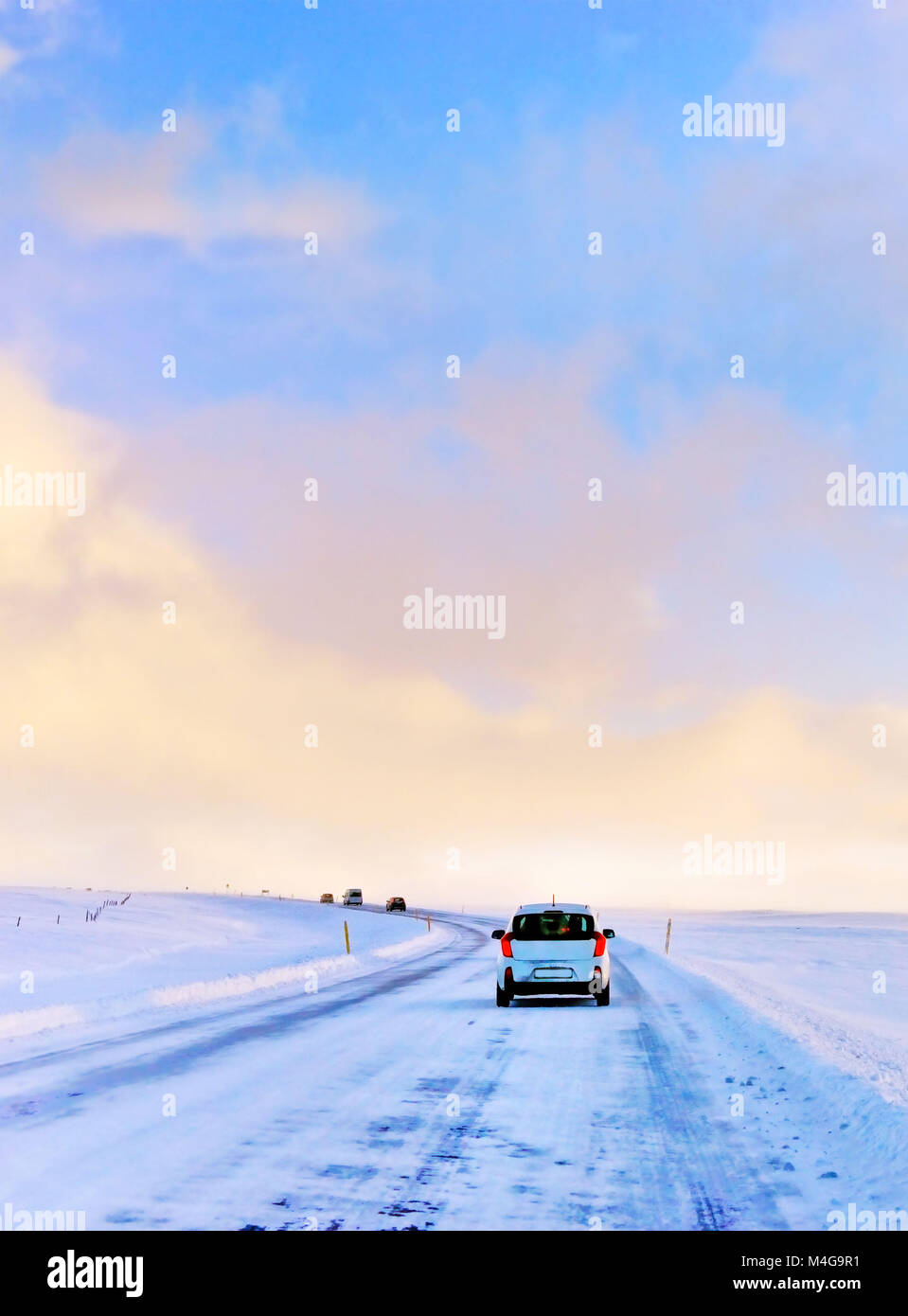 Car driving on the icy road in winter on the plateau in Iceland Stock ...