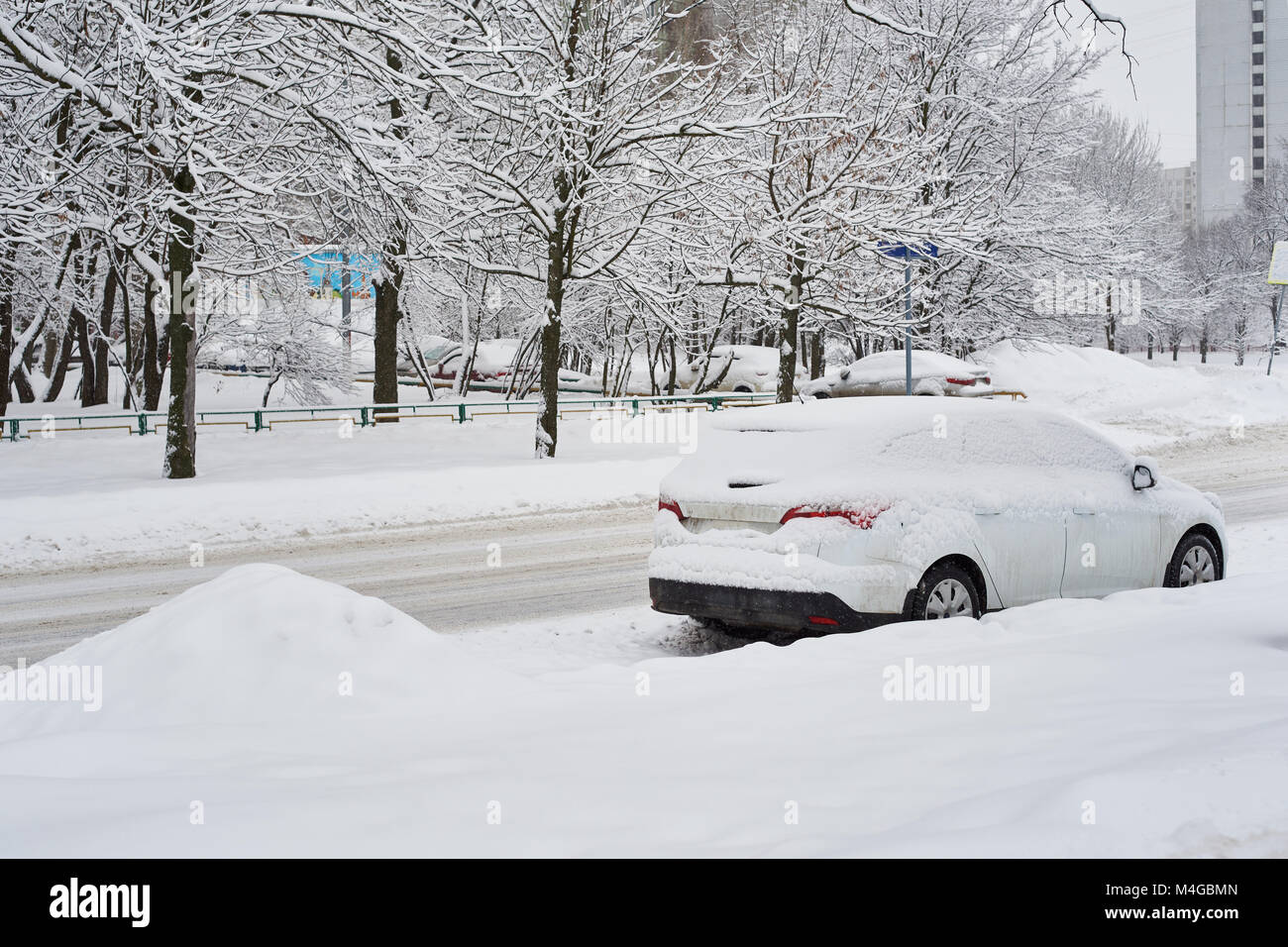 Cars on the road in the snowfall Stock Photo - Alamy