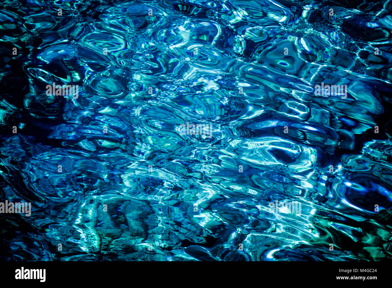Deep blue liquid water surface. Abstract background Stock Photo - Alamy
