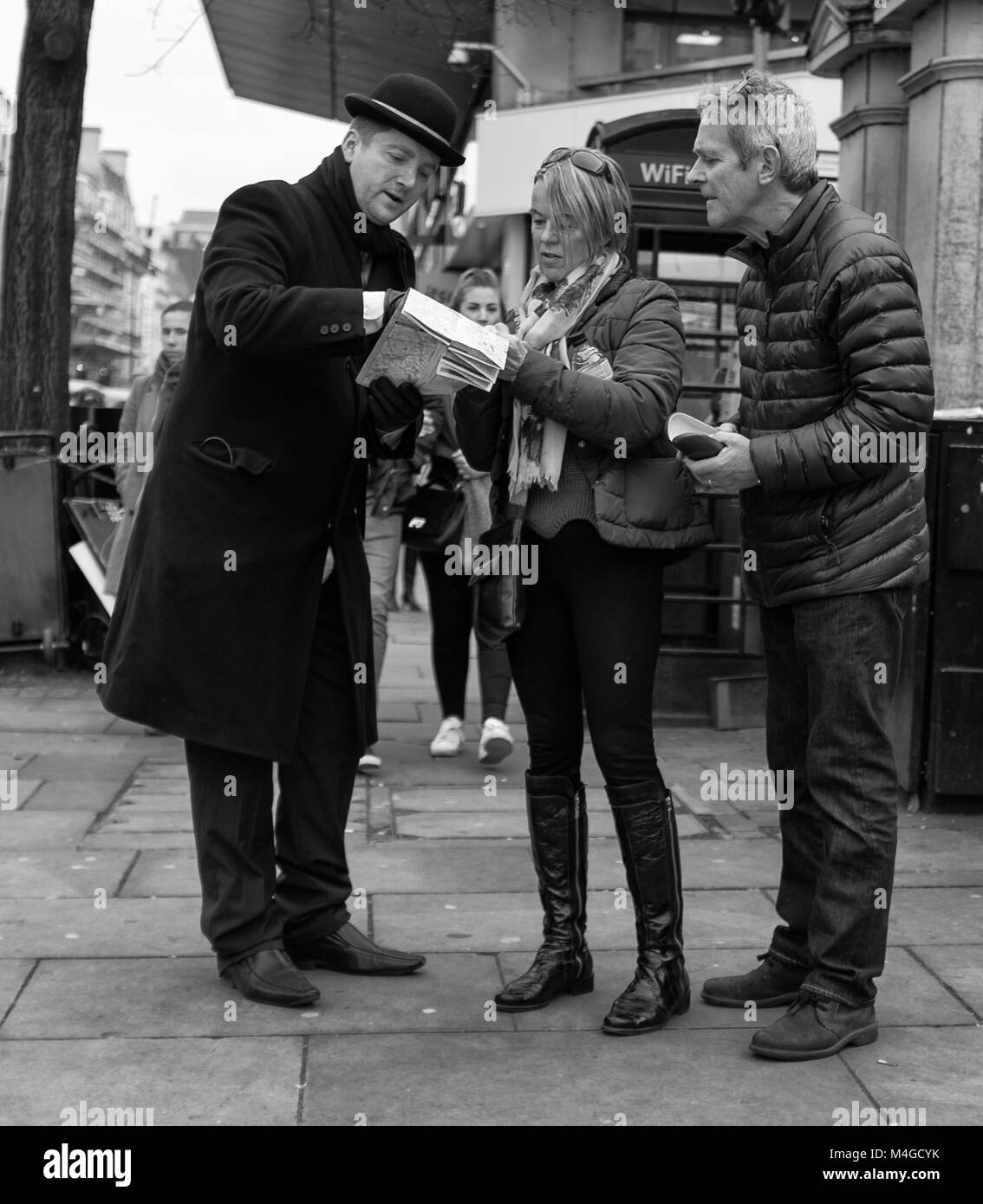Man giving directions Black and White Stock Photos & Images - Alamy