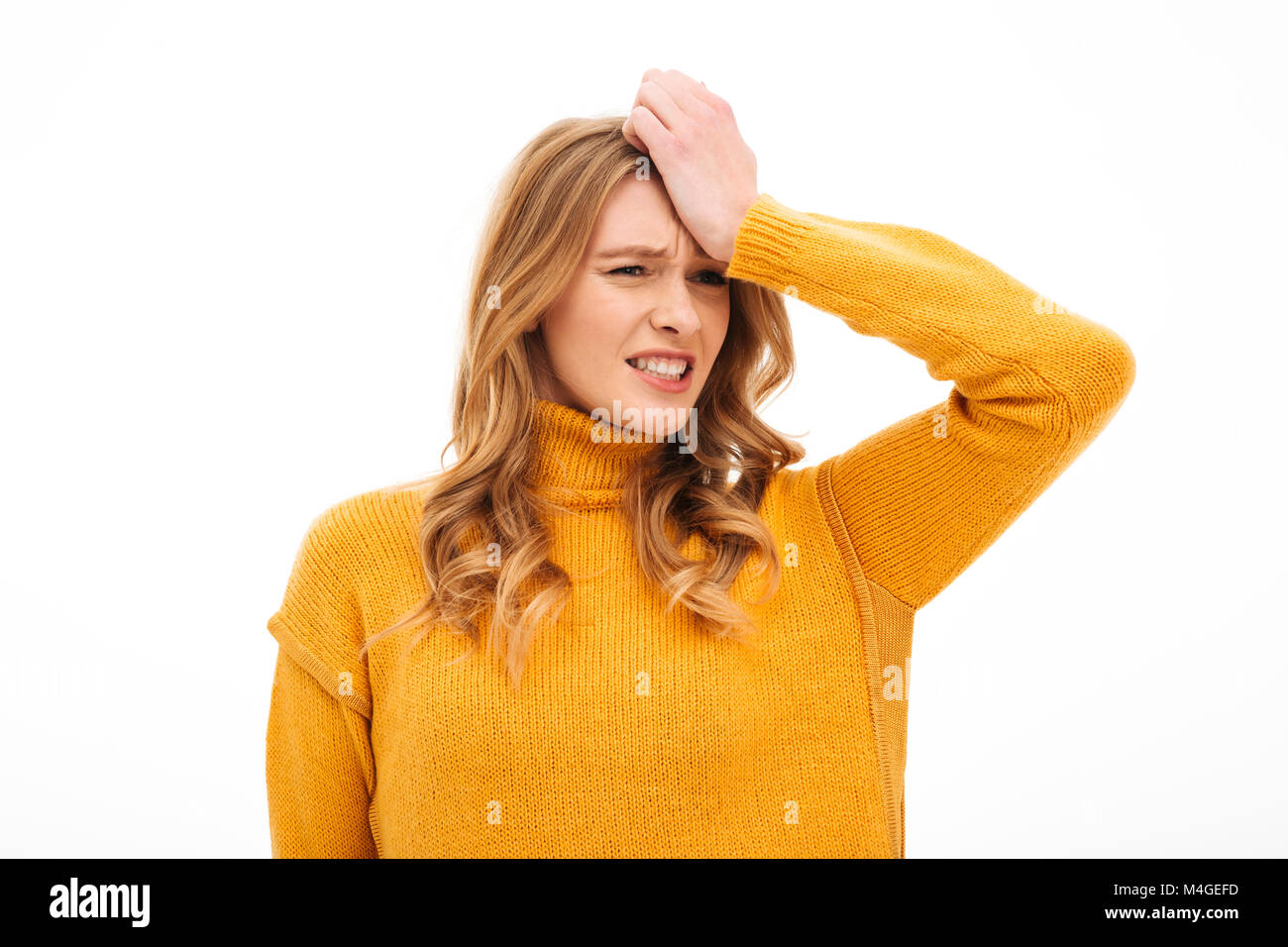 Photo of young confused lady standing isolated over white background ...