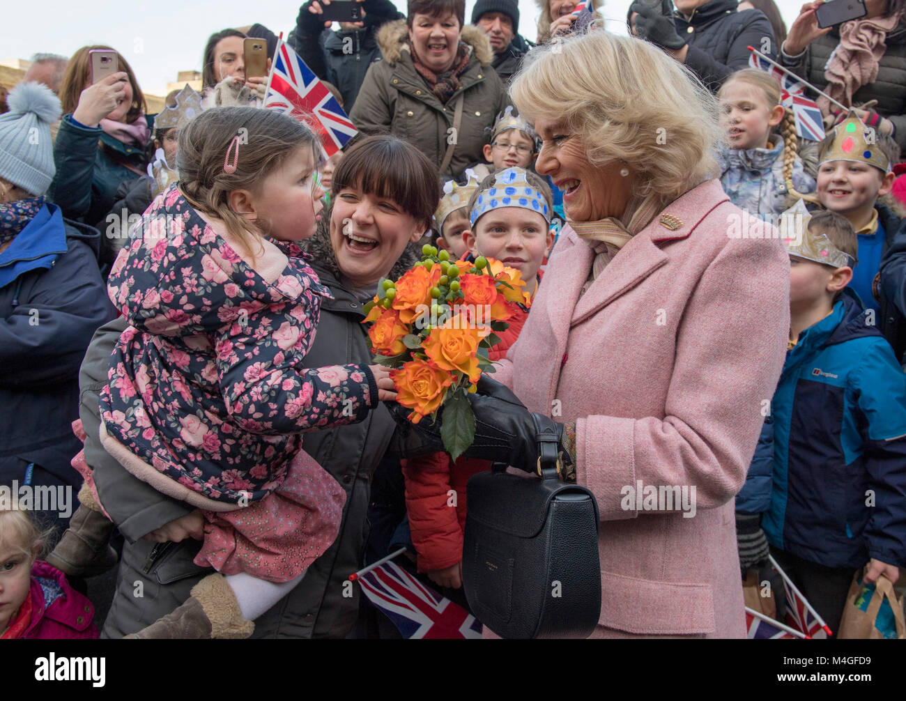 The Duchess of Cornwall is given flowers by Sophia Helme after her ...