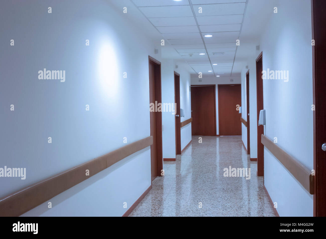 Corridor interior inside a modern hospital, clean and tidy Stock Photo ...