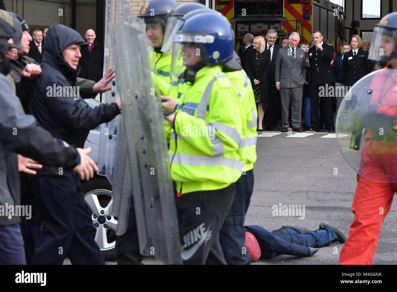 The Prince of Wales (centre right) watches a fire and public order ...