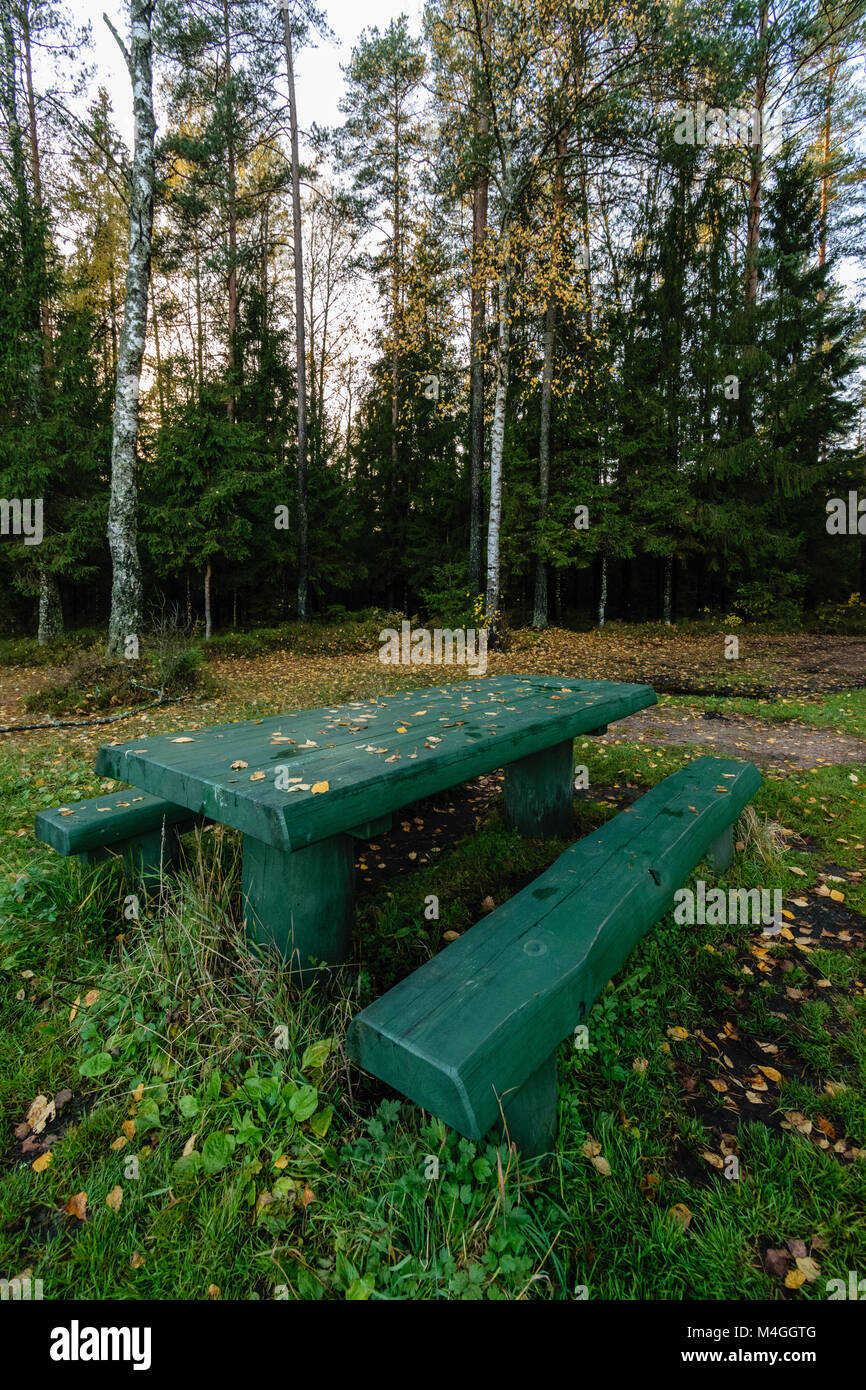 camping and resting area by the river with bench and fireplace. natural ...