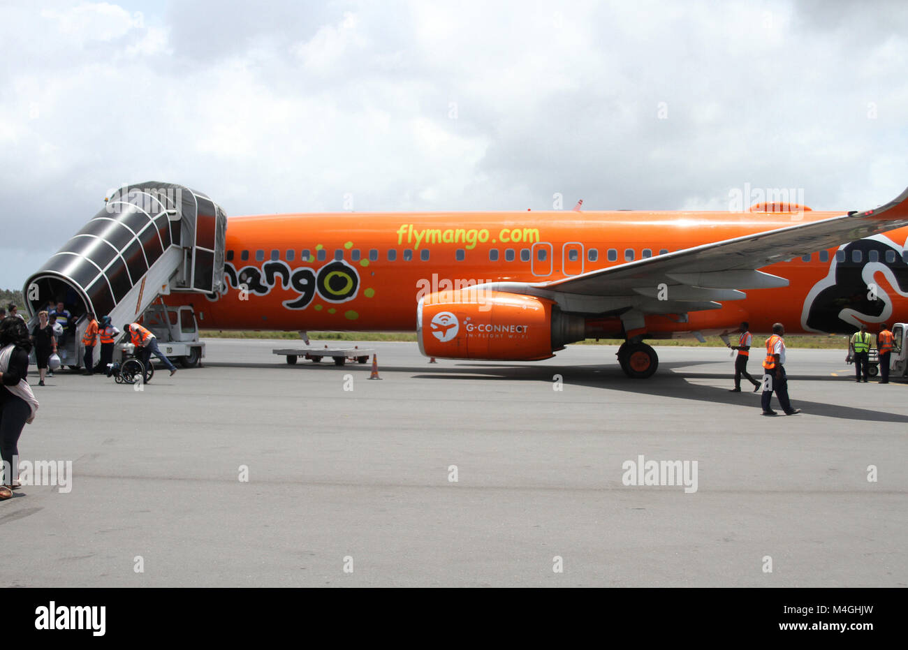 Tourist deboarding airplane, Zanzibar, Tanzania Stock Photo - Alamy